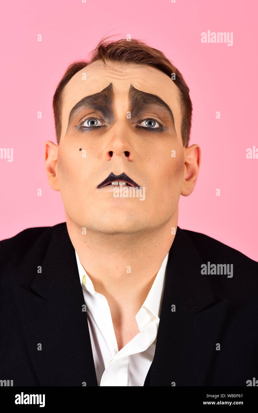 Skill at improvisation. Mime artist. Mime with face paint. Man with ...