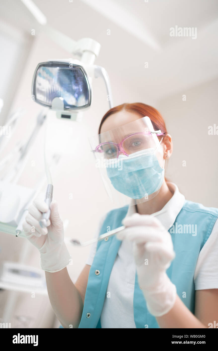 Female dentist doctor in protective hi-res stock photography and images ...