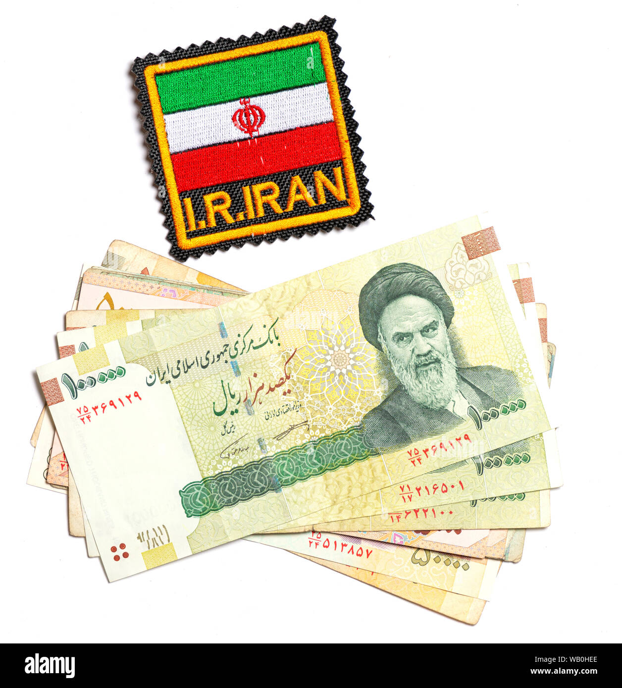 Iranian flag with Iranian money depicting Ruhollah Khomeini Stock Photo ...