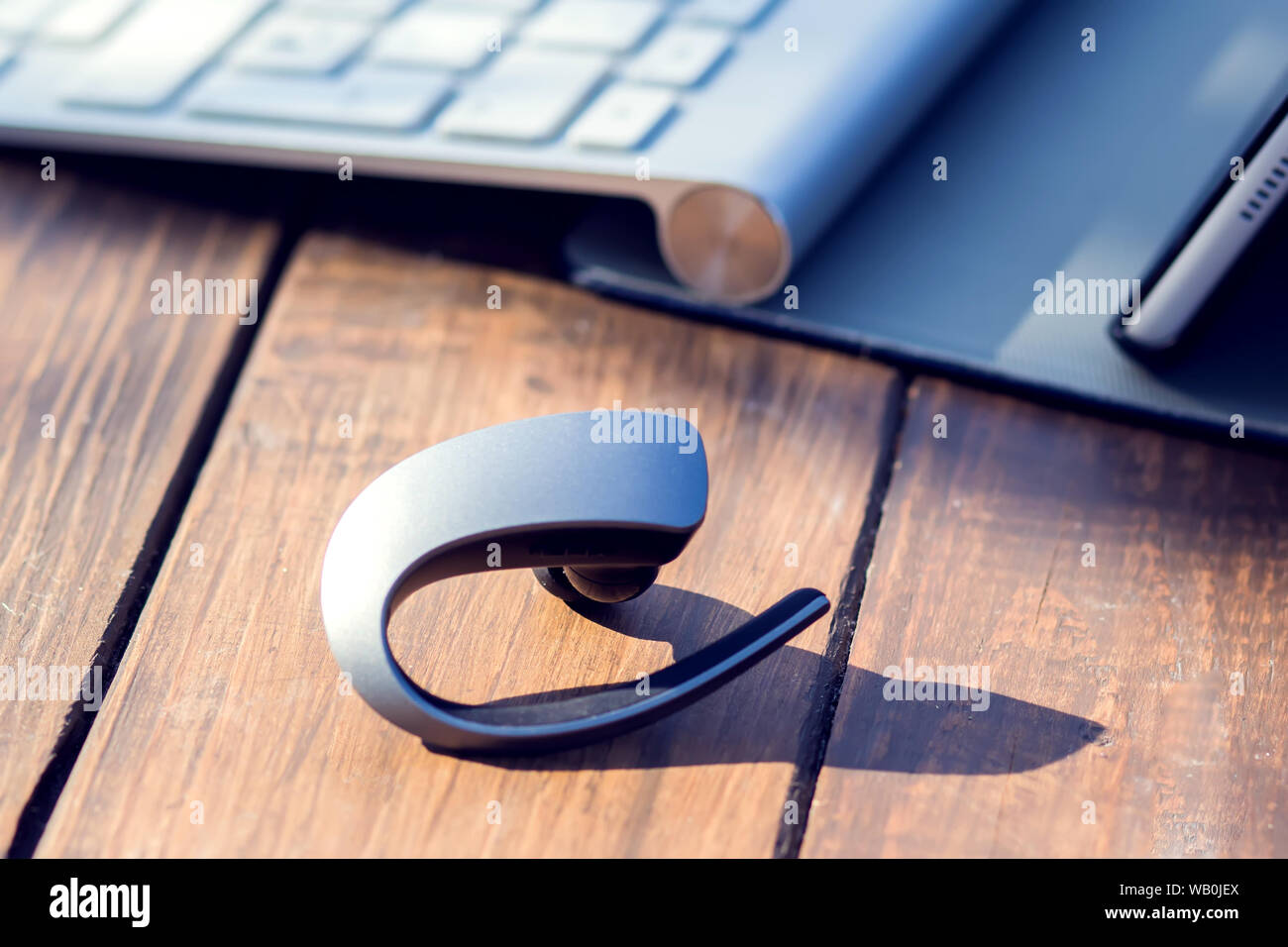 Electronic connection device for communication and laptop on the wooden ...