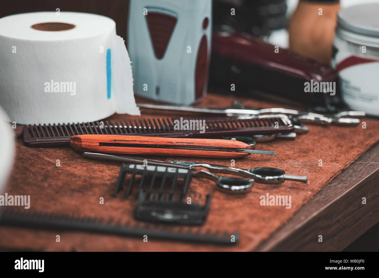 Barber shop tools on old wooden background Stock Photo - Alamy