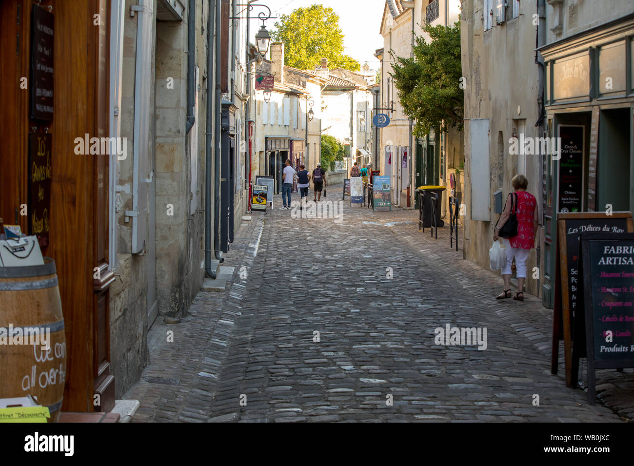 St Emilion, France - September 11, 2018: Tourists in the cobbled ...