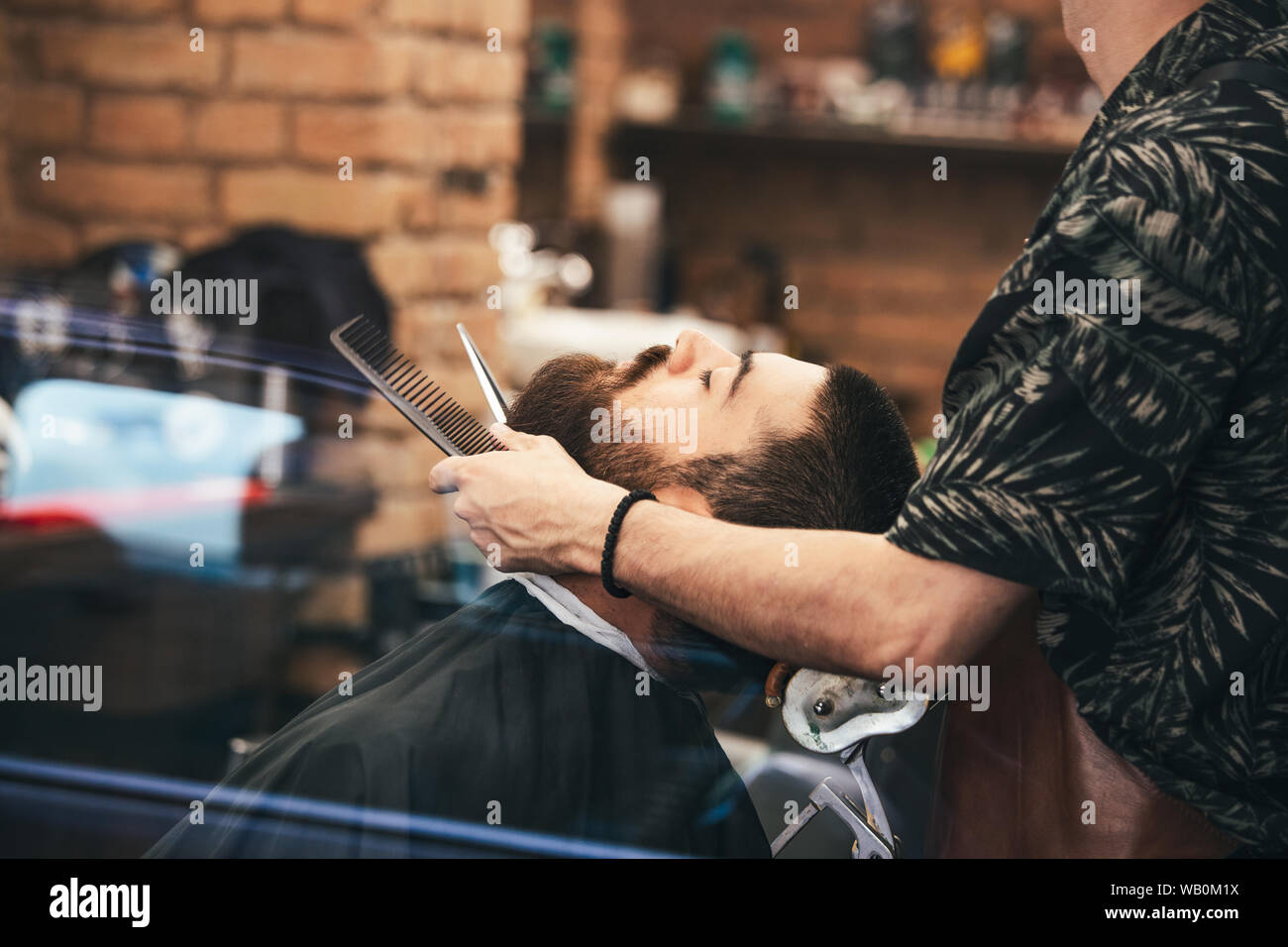 Arm holding comb hi-res stock photography and images - Alamy