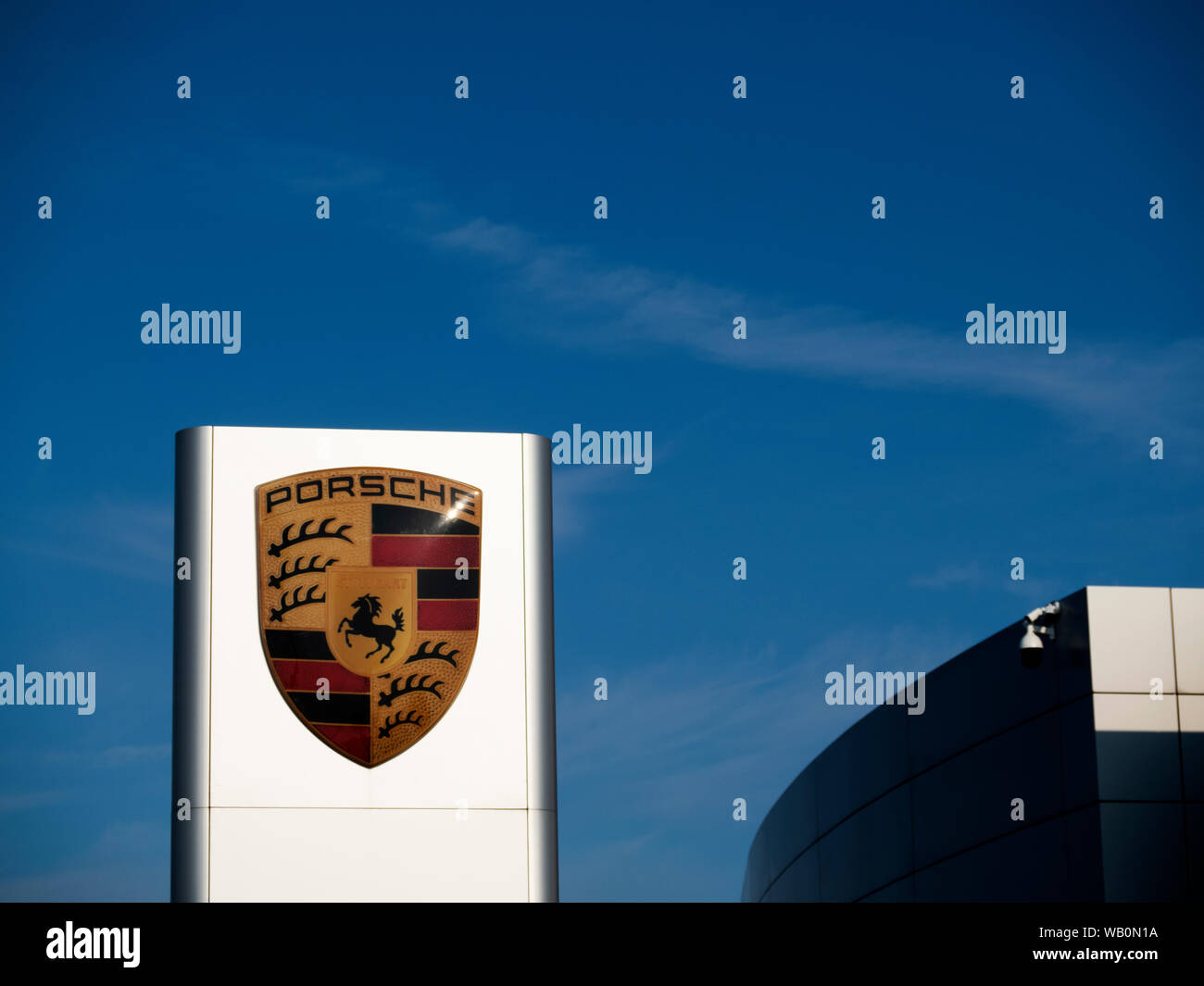 Sign at the entrance of a Porsche store Stock Photo - Alamy
