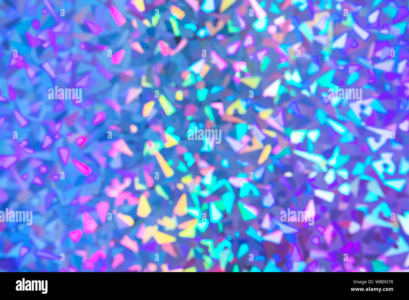 Abstract trendy holographic triangle background in 80s style. Blurred ...