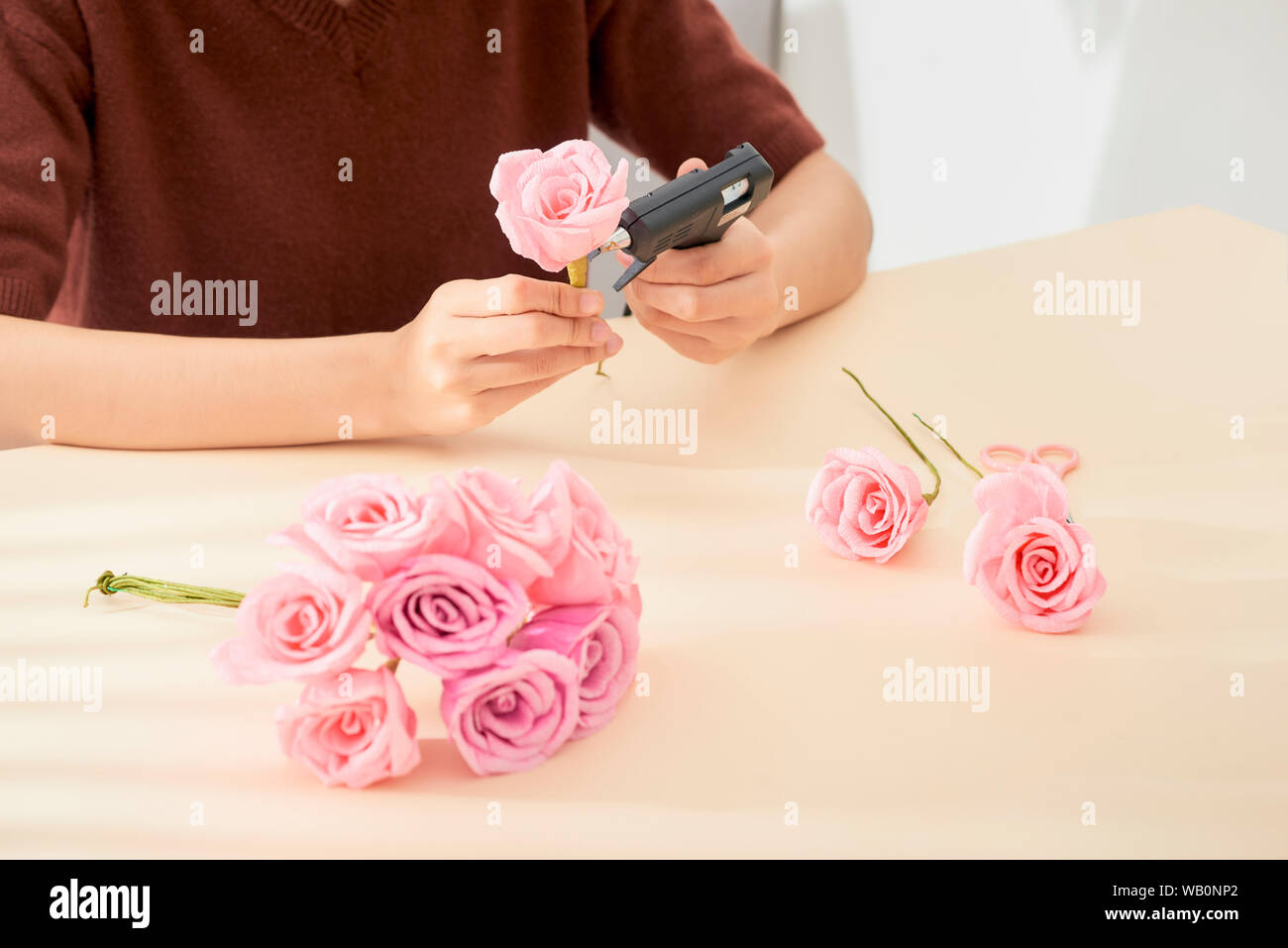 People making paper craft flower art Stock Photo - Alamy