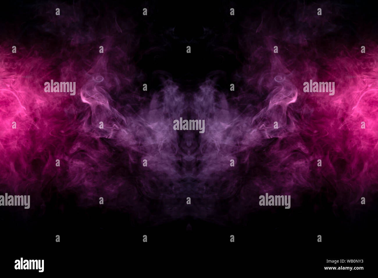 Smoke of different blue, red and pink colors in form of horror in the ...