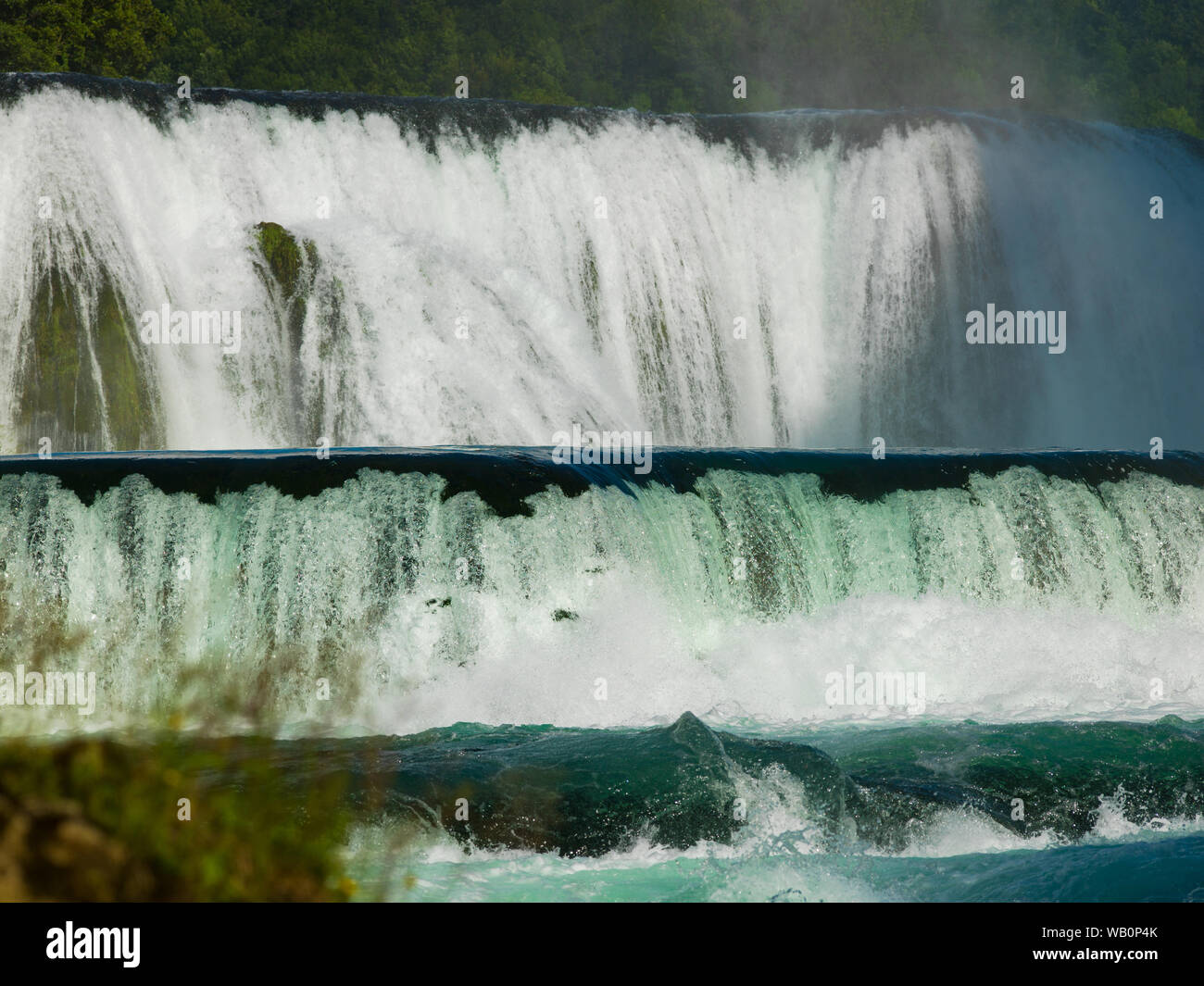 waterfall in beautiful nature with crystal clear water on wild river ...