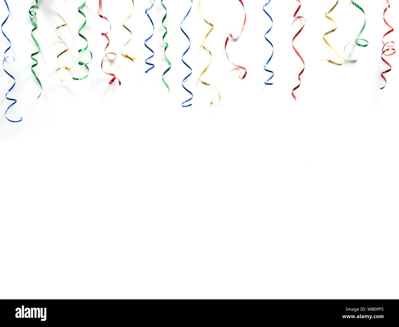 White wall decorated with streamers Stock Photo - Alamy