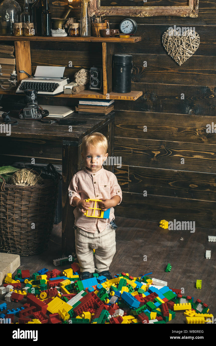 Child play with colorful bricks. Little child build structure with toy ...