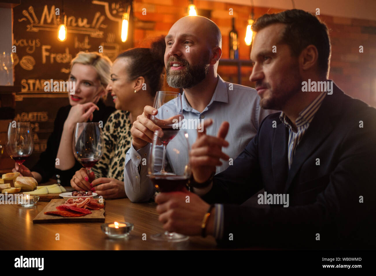 Tapas bar with bar man and man sitting at bar hi-res stock photography ...