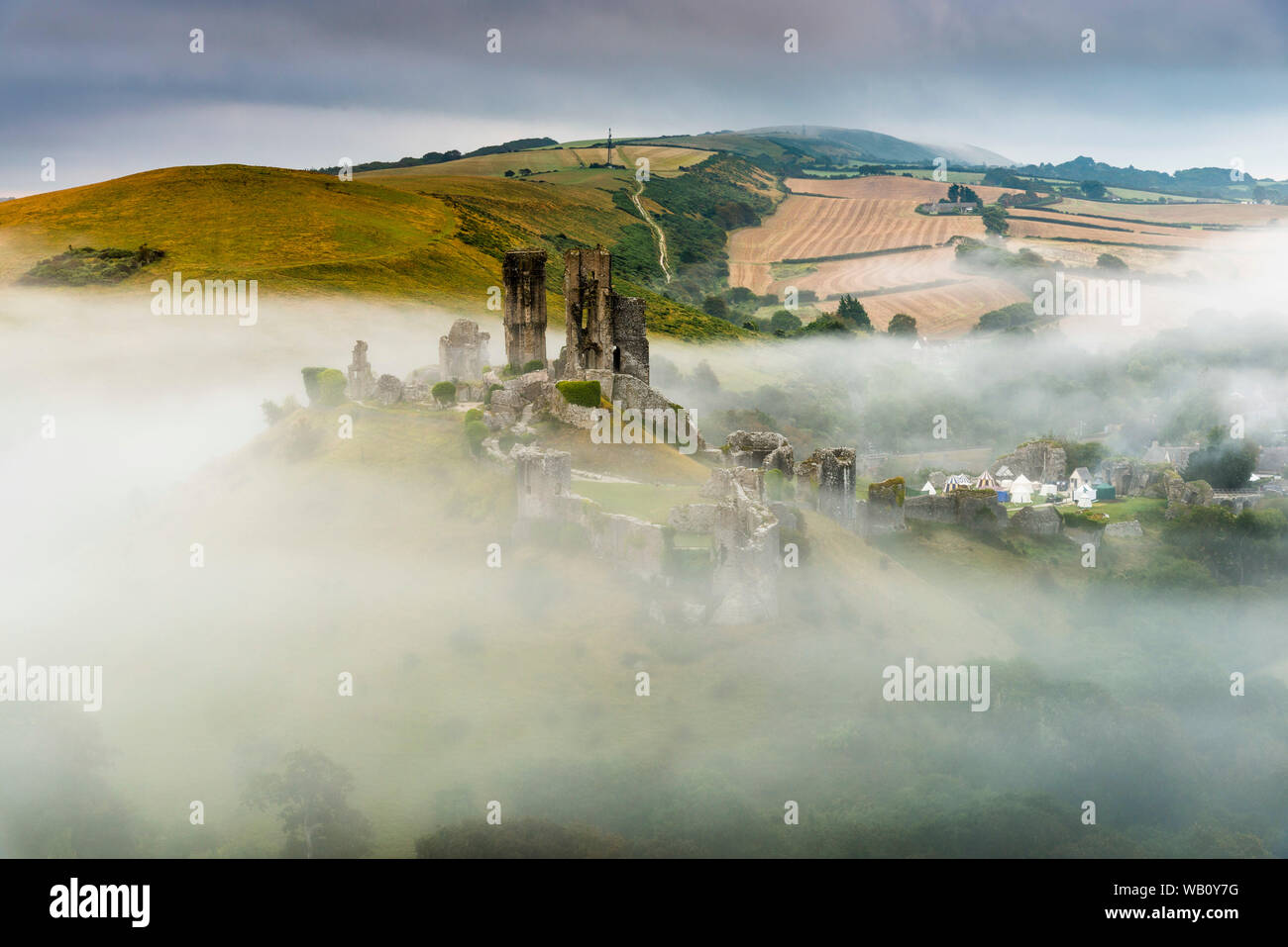 Corfe Castle, Dorset, UK. 23rd August 2019. UK Weather. A moody start ...