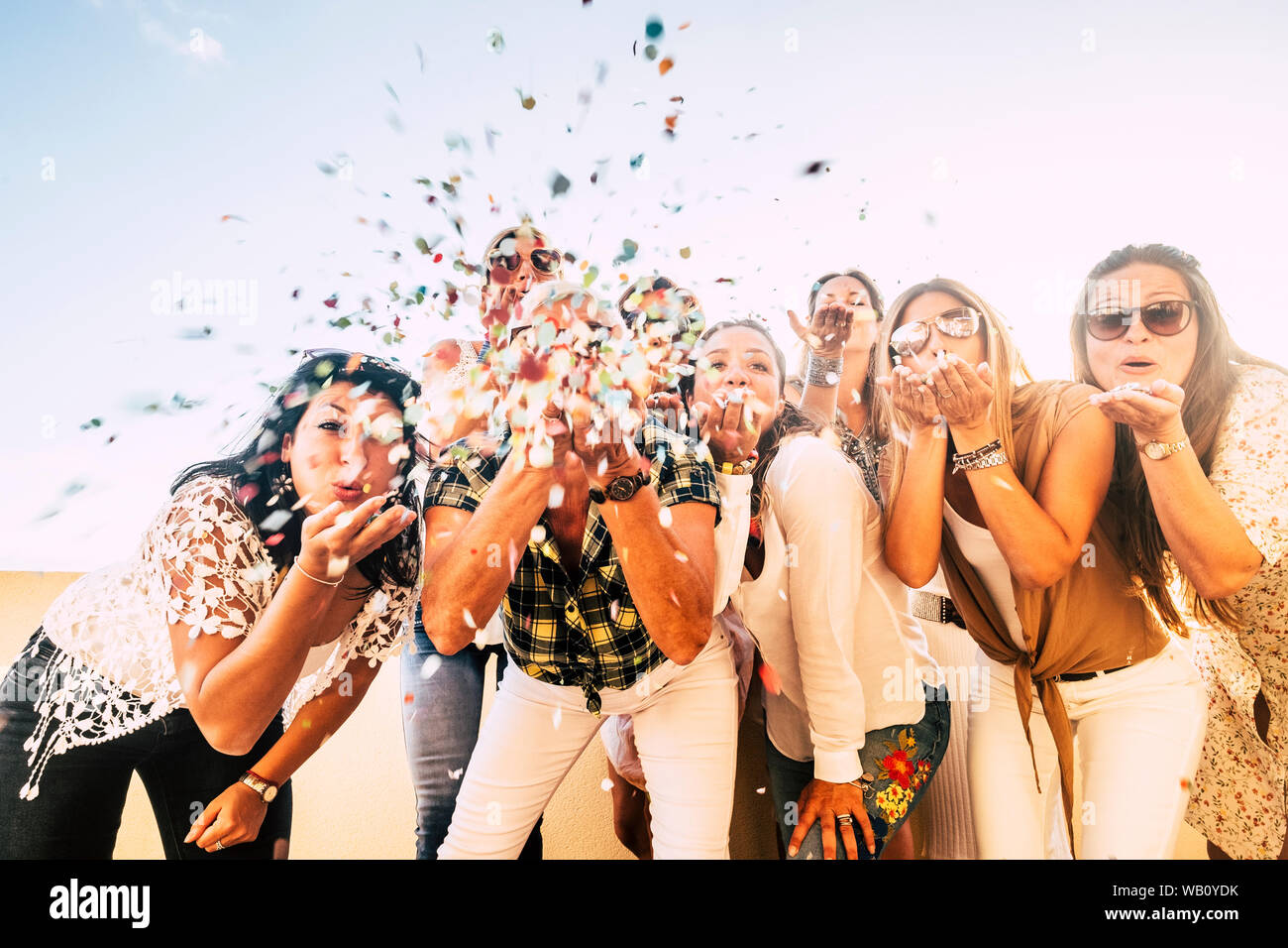 Women friendship confetti hi-res stock photography and images - Alamy