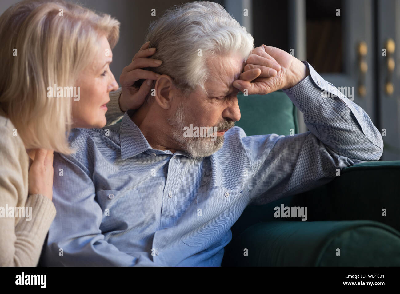 Husband consoling sad wife hi-res stock photography and images - Alamy