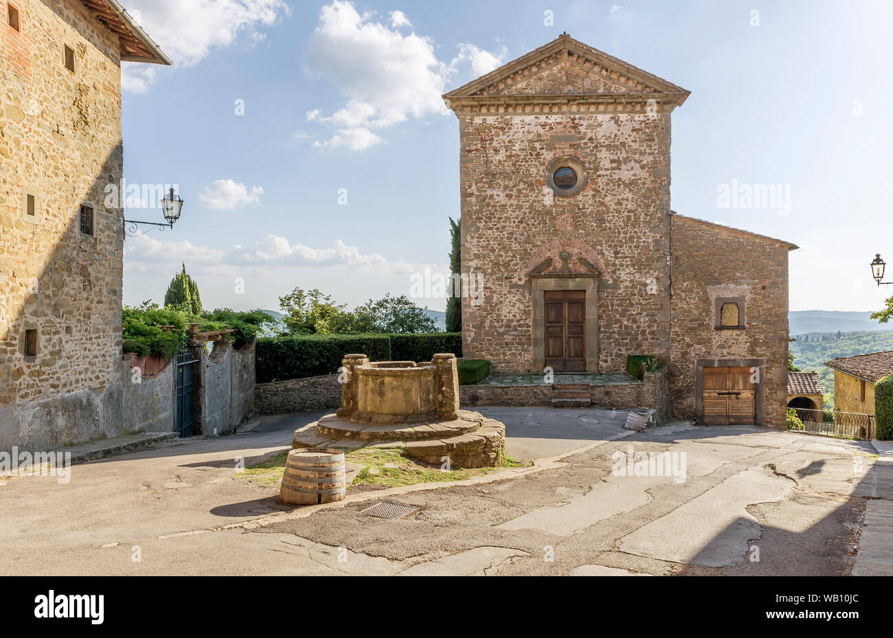 Old village well on a church square hi-res stock photography and images ...