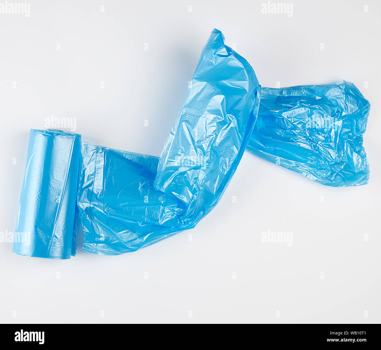 twisted blue plastic bags for bin on white background, top view Stock ...