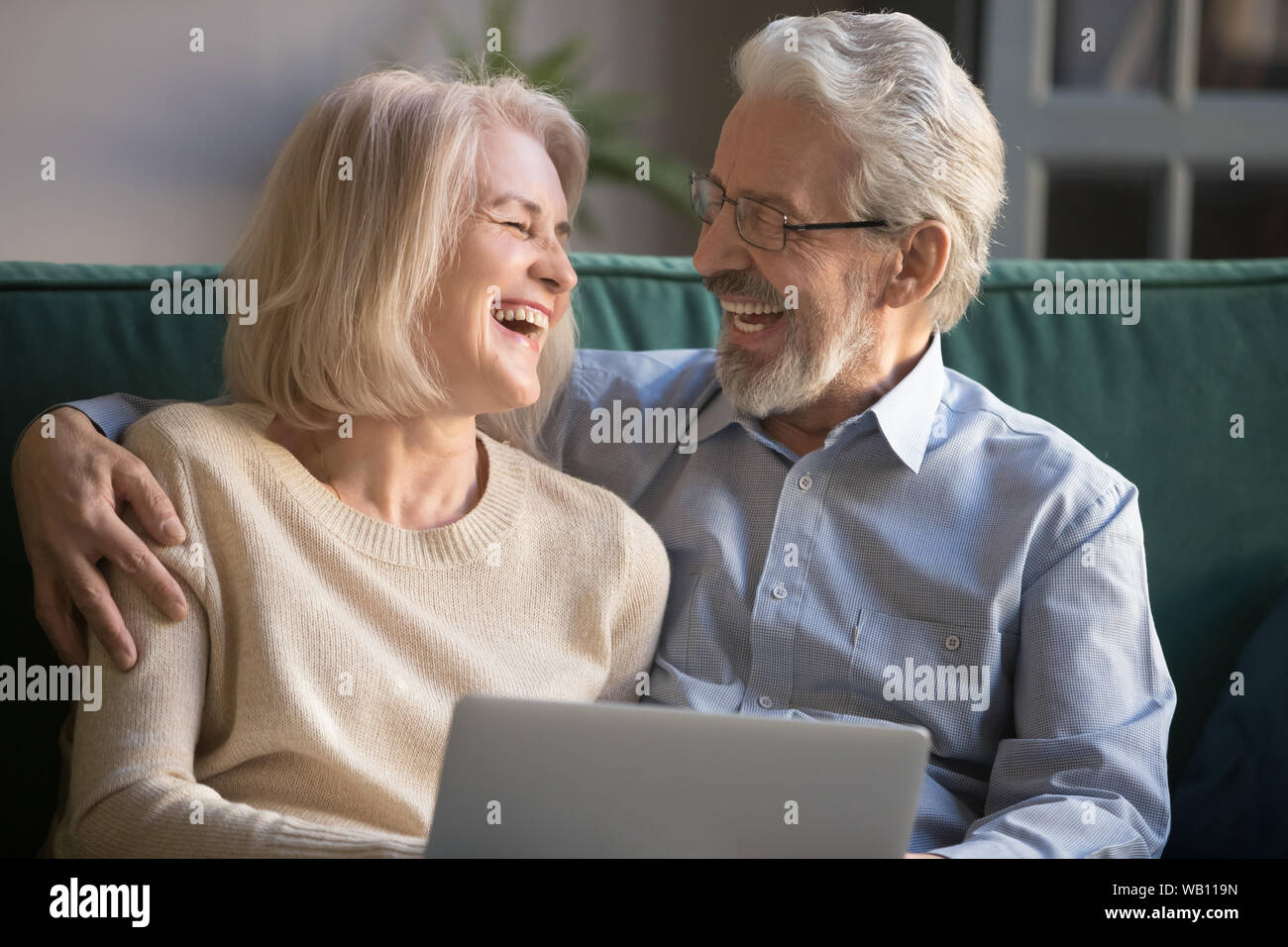 Older couple using modern technology hi-res stock photography and ...