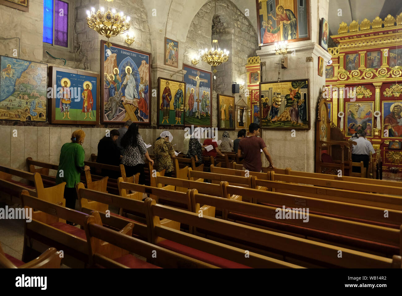 Palestinian Christians praying inside the the Church of Transfiguration ...
