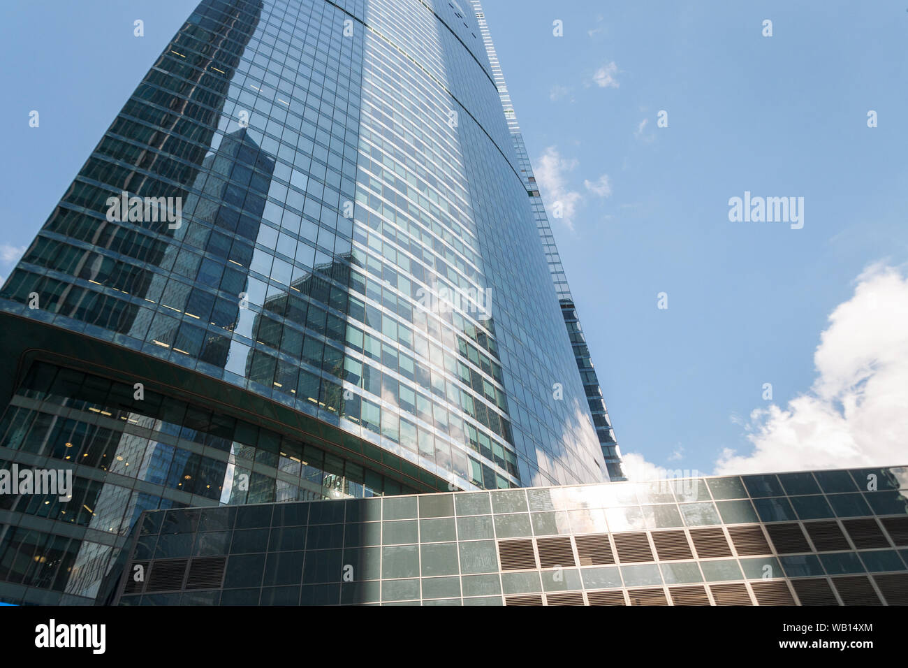 Glass skyscraper against the sky. Bank, office, corporate building ...