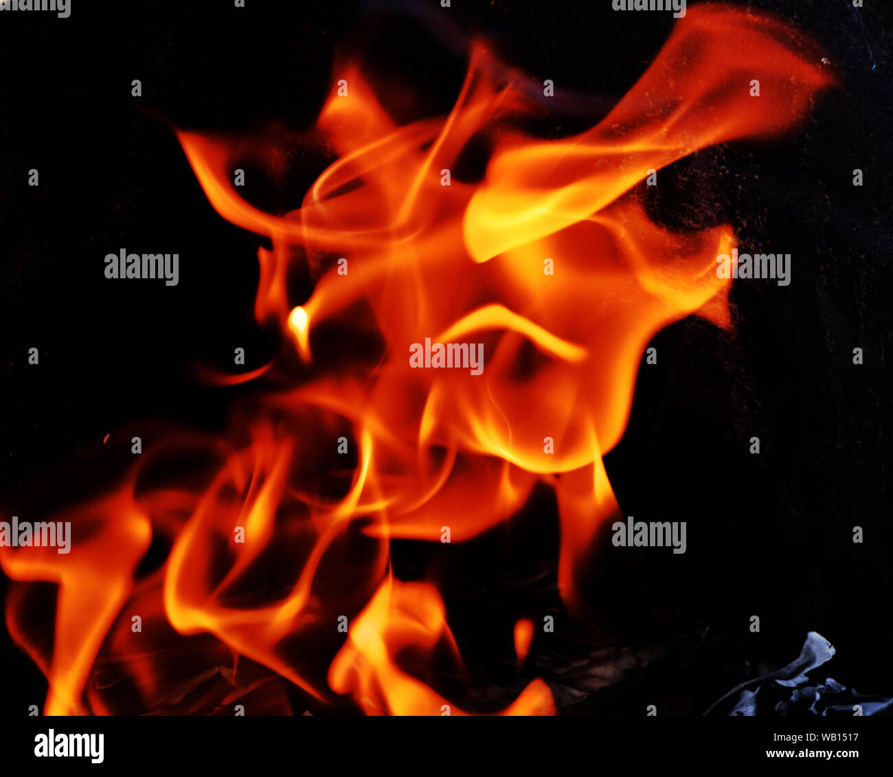 Orange flame on black hi-res stock photography and images - Alamy