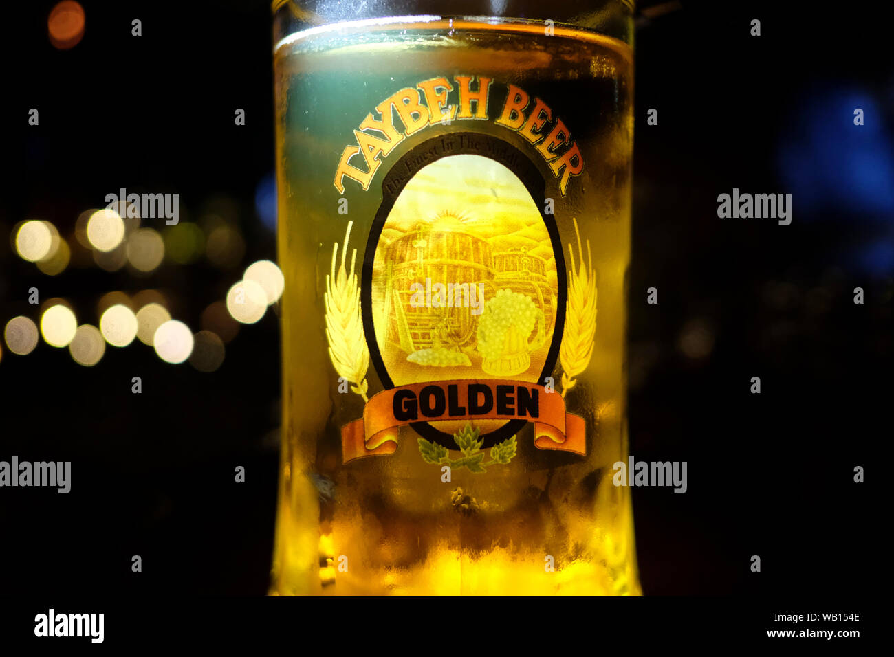 A glass filled with the local Palestinian Taybeh beer in a bar in ...