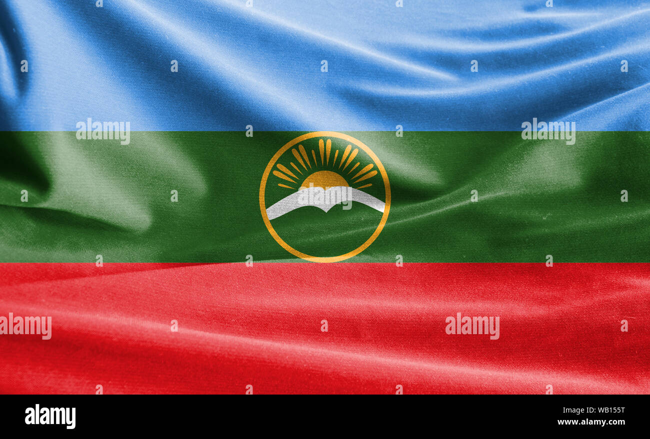 Realistic flag of Karachay Cherkessia on the wavy surface of fabric ...