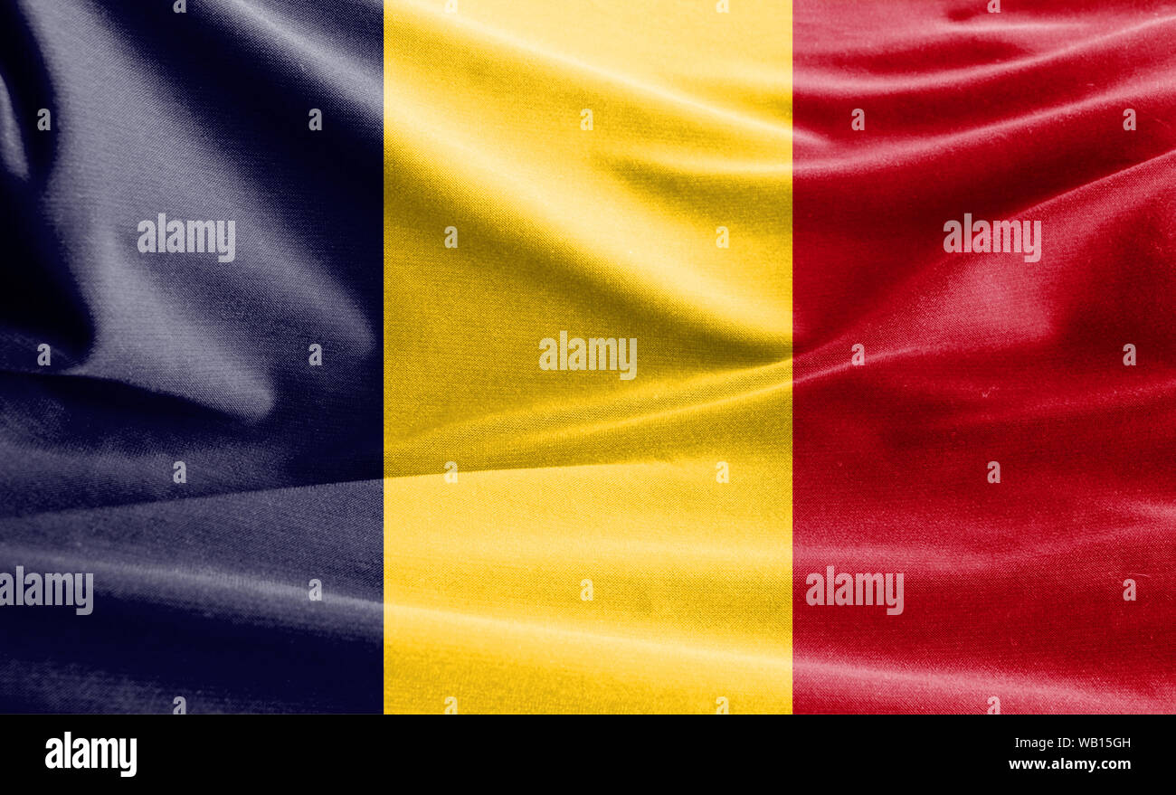 Realistic flag of Chad on the wavy surface of fabric Stock Photo - Alamy