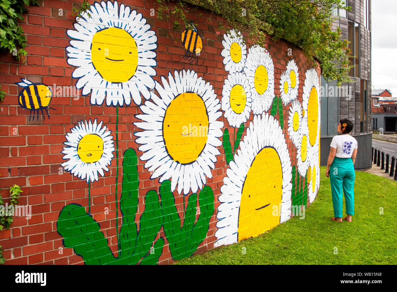 Rochdale, UK. 23rd Aug, 2019. Graffiti artists painting the town in ...