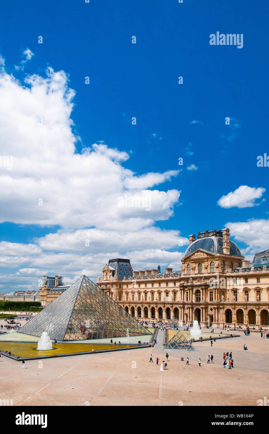 JUNE 8, 2011 PARIS, France : Louvre Pyramid and French building of ...