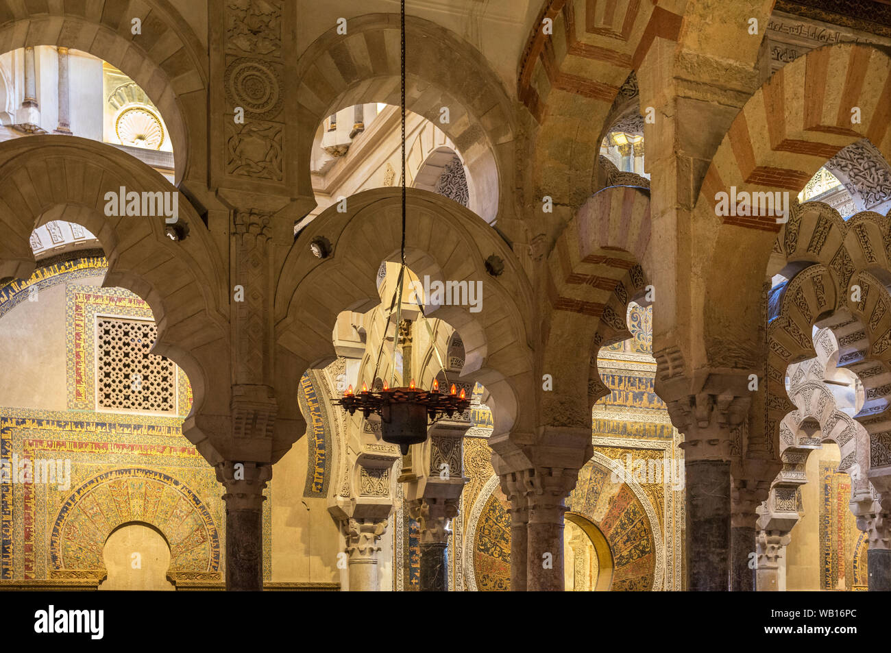 Pillars and multi-lobed arches in front of the mihrab. The Great Mosque ...