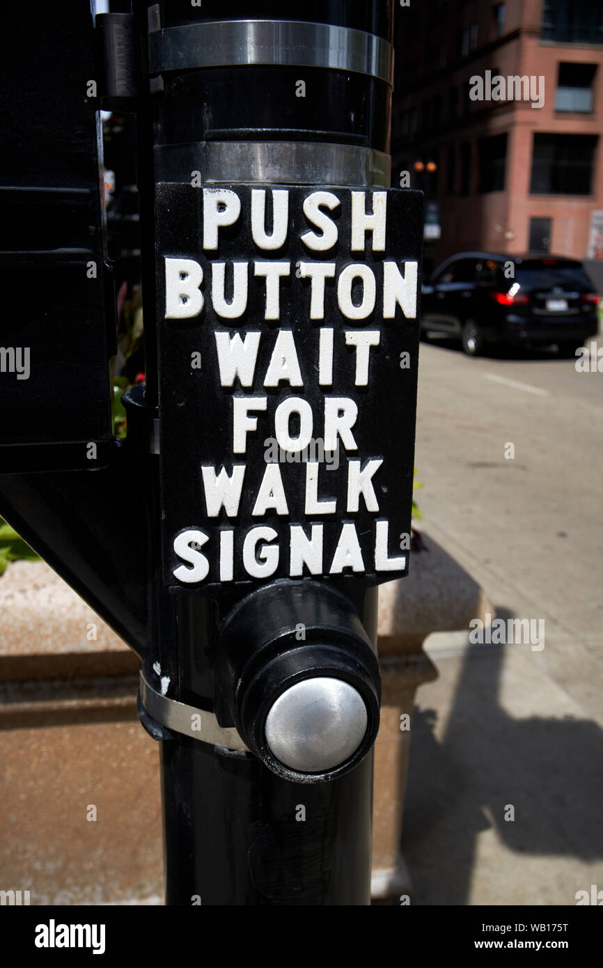 push button for walk signal at crosswalk in downtown chicago illinois ...