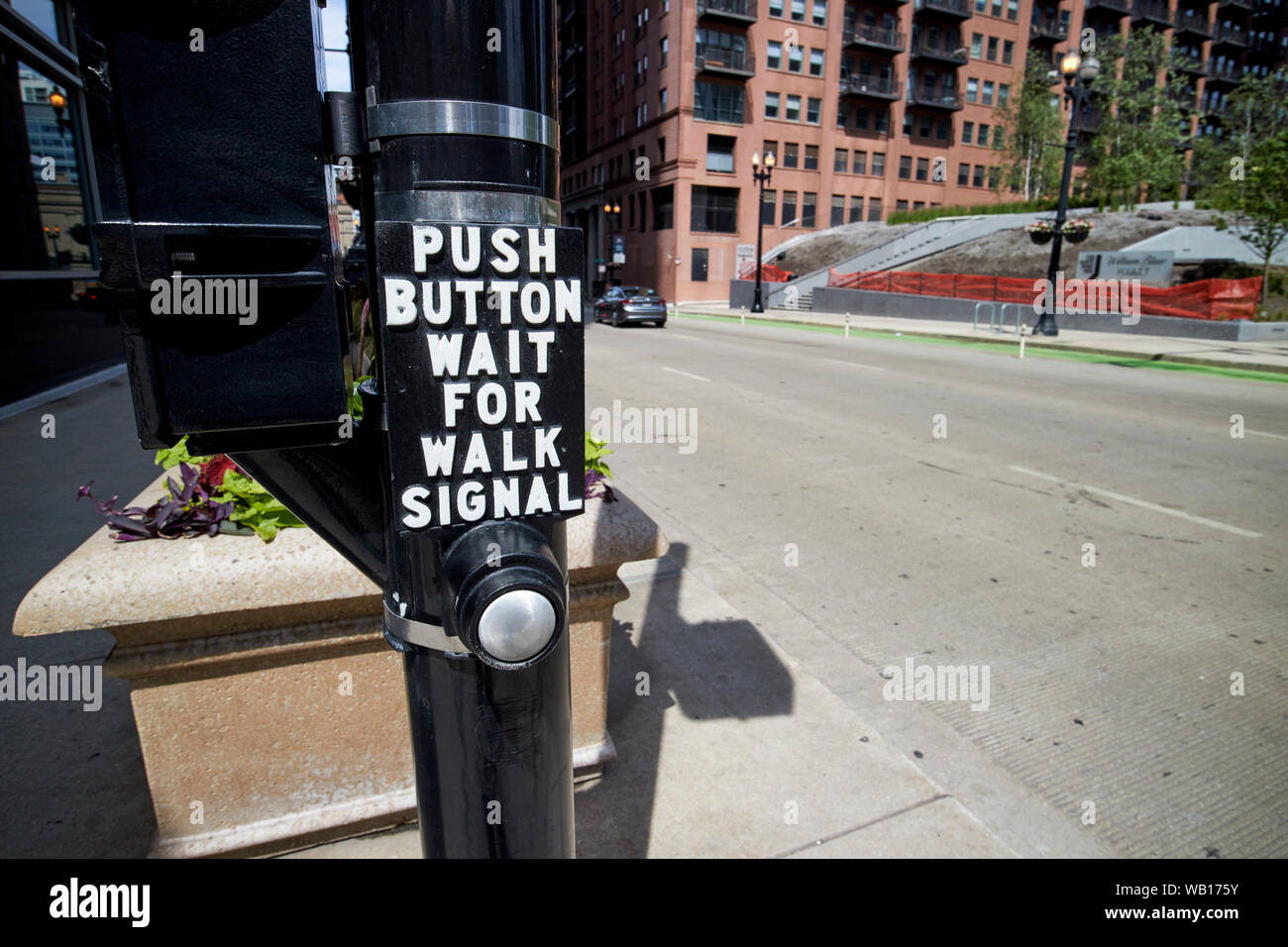 push button for walk signal at crosswalk in downtown chicago illinois ...