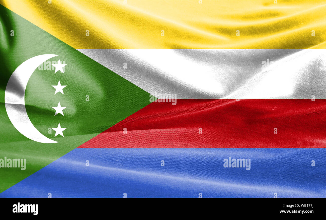 Realistic flag of Comoros on the wavy surface of fabric Stock Photo - Alamy