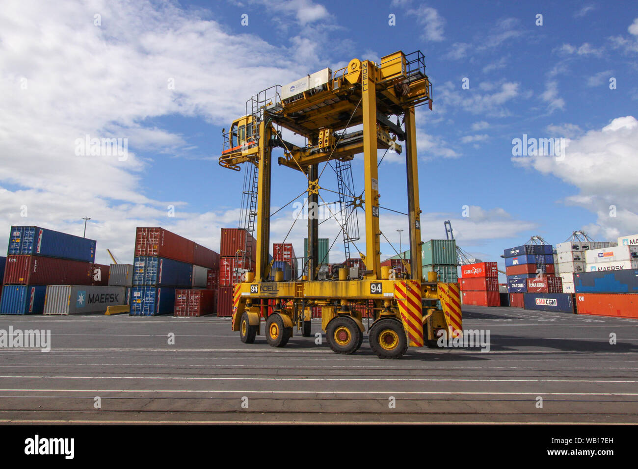 Driving Straddle Carrier (Van Carrier) without container in the harbour ...