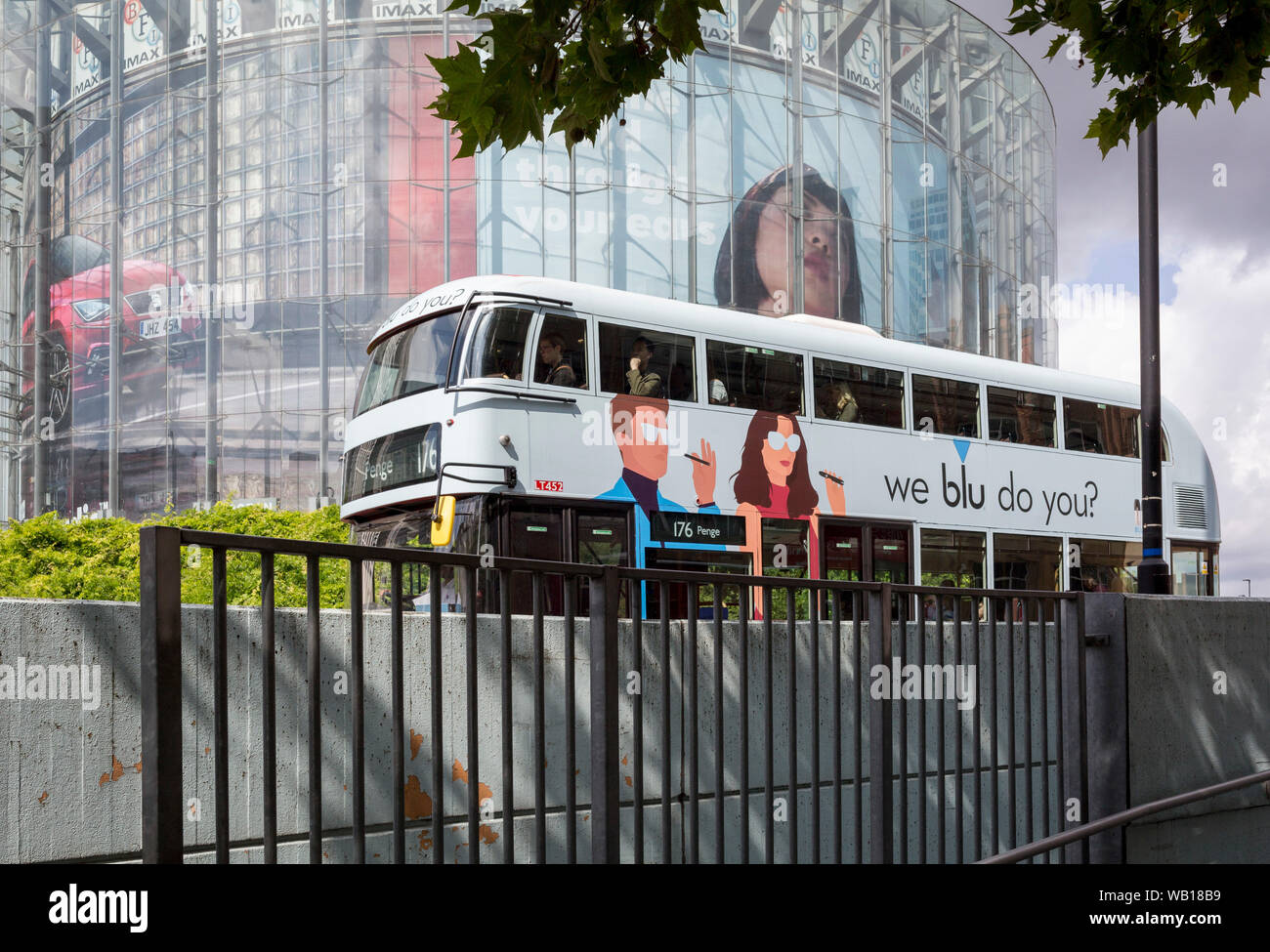 A London bus with advertising for vape brand Blu passes the head of a ...