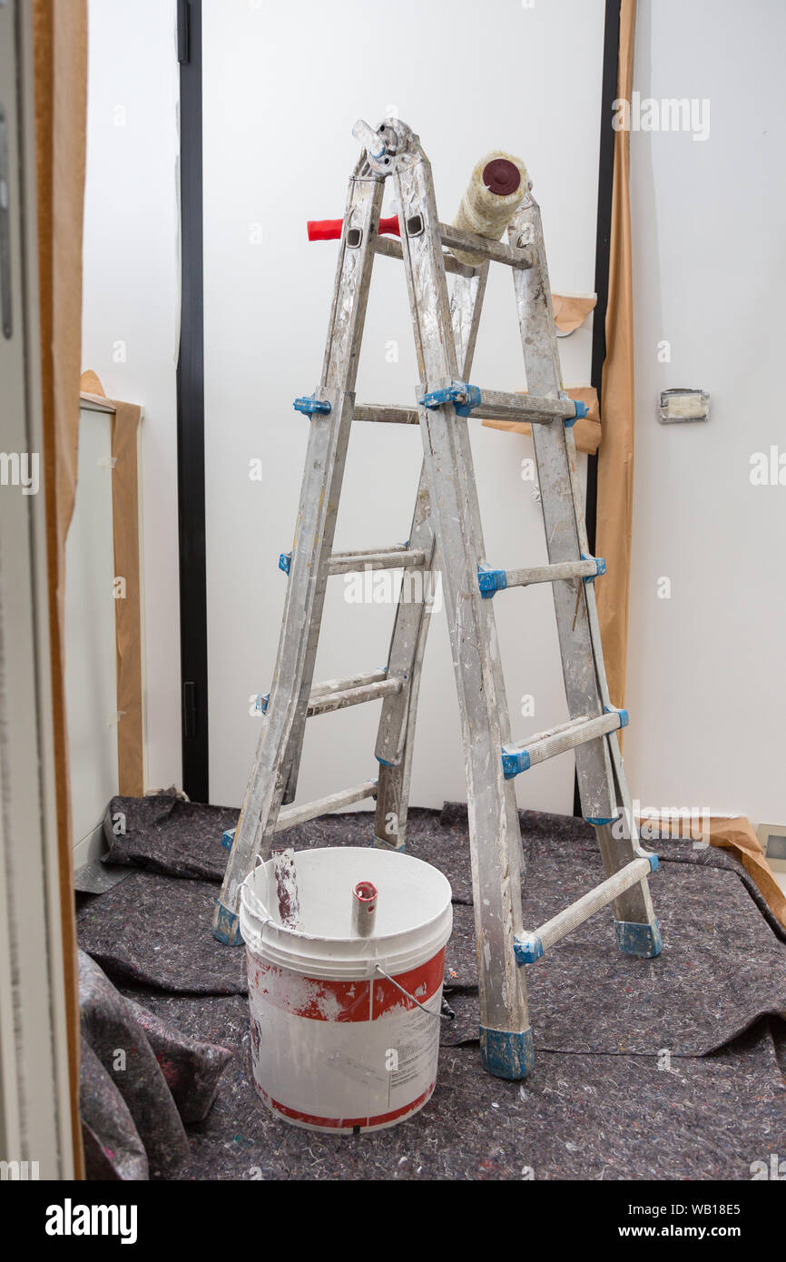 Staircase and Tools for Painting and Floor Covered with Protective ...