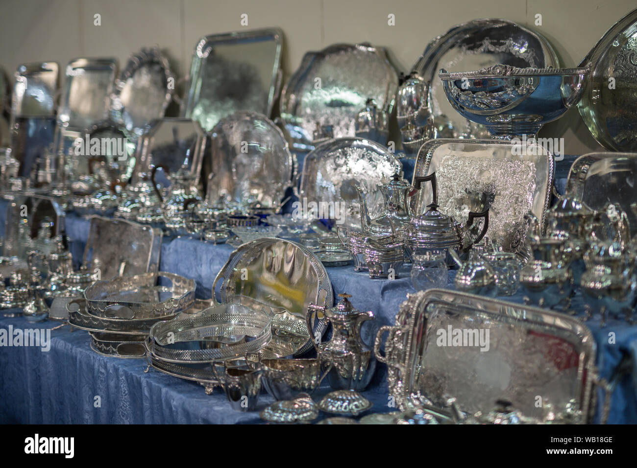 Silverware Stand with Cutlery, Tray, Plates and Vases Stock Photo - Alamy