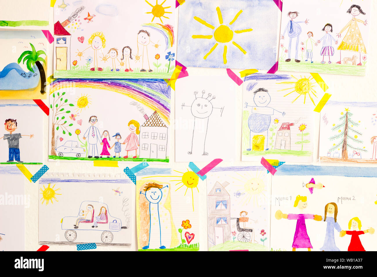 Child's drawings hanging on wall Stock Photo - Alamy