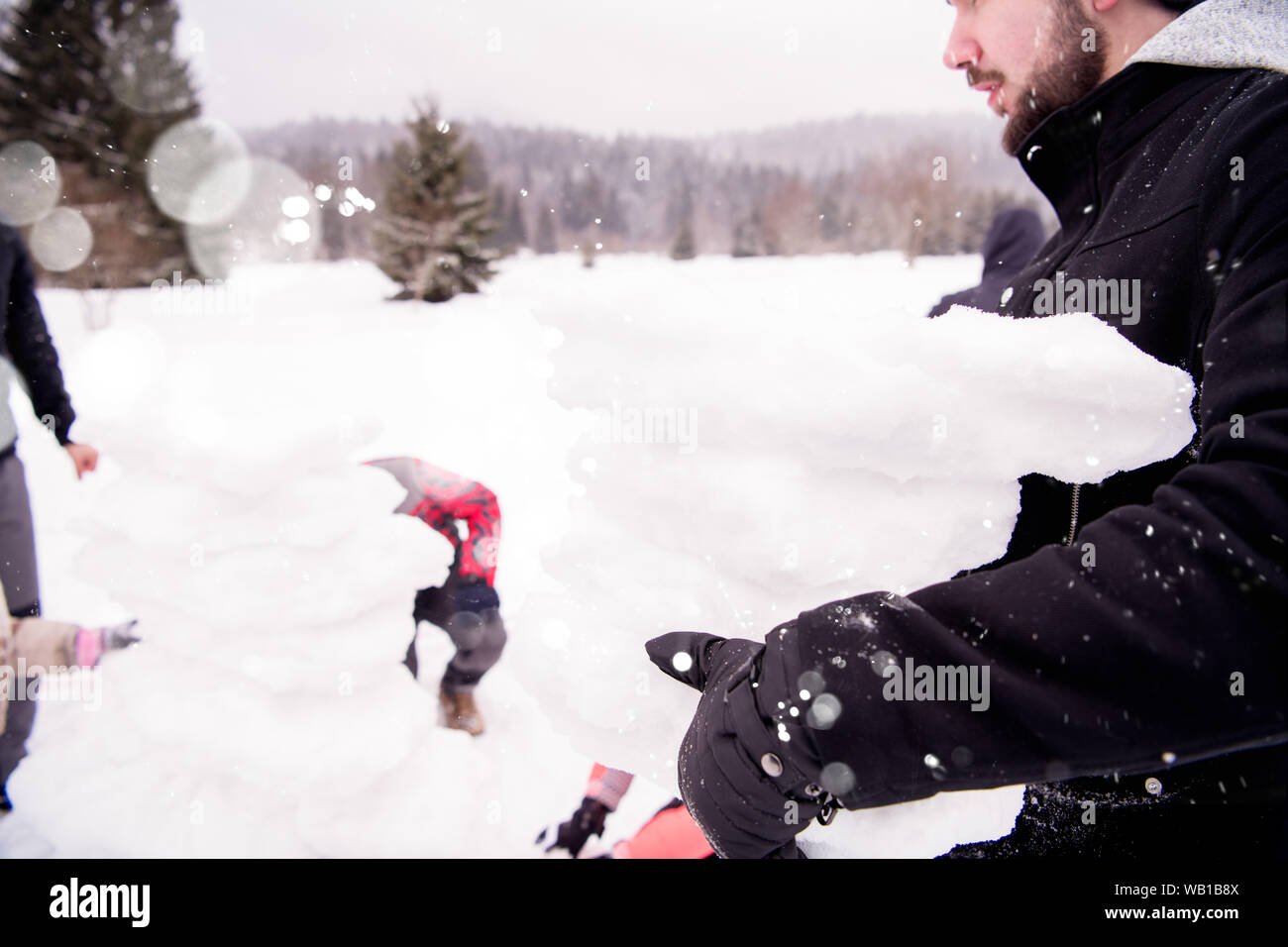 group of young happy business people having a competition in making ...