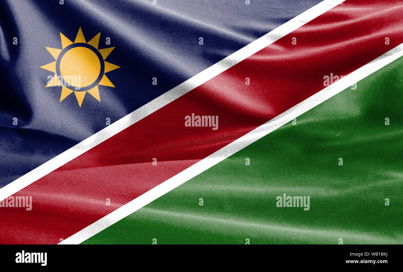 Realistic flag of Namibia on the wavy surface of fabric Stock Photo - Alamy