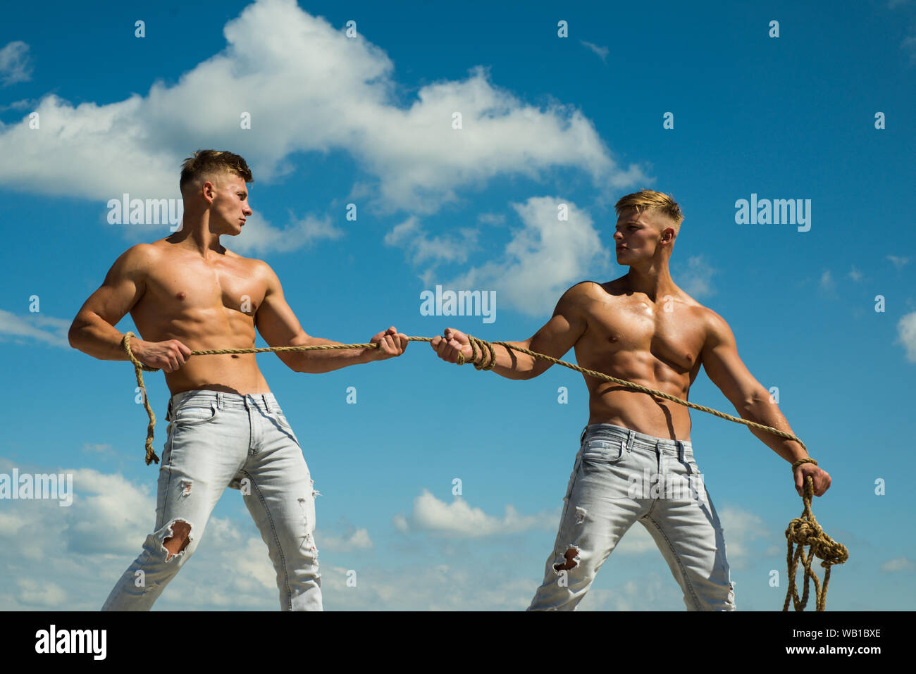 Force and power. Twins competitors with muscular bodies. Strong men ...