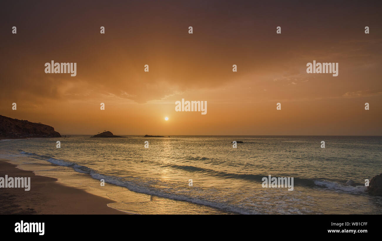 The sunset under the beautiful blue sky on beach Stock Photo - Alamy