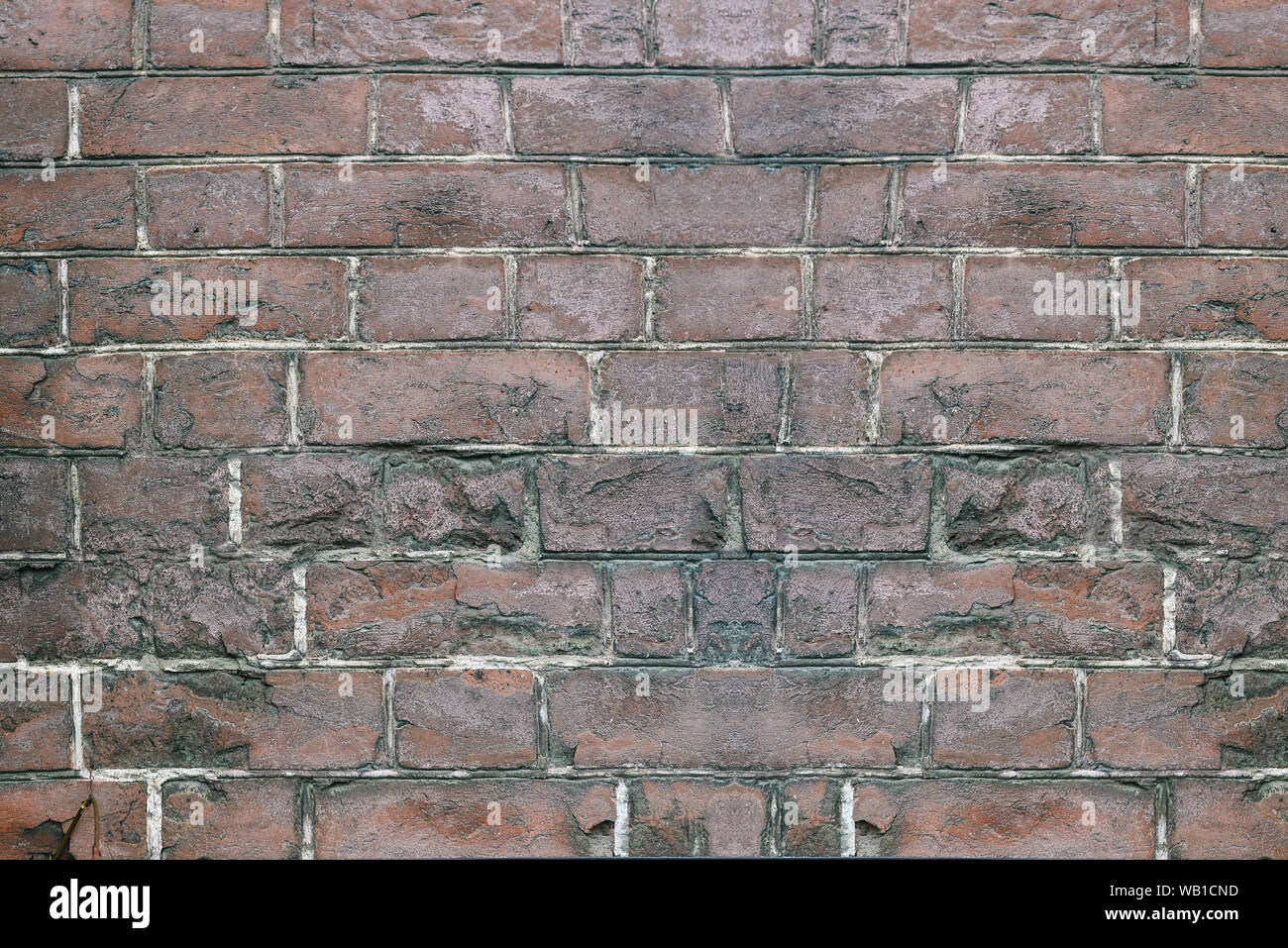 The brick wall is brown. Ancient masonry. The architecture of the city ...
