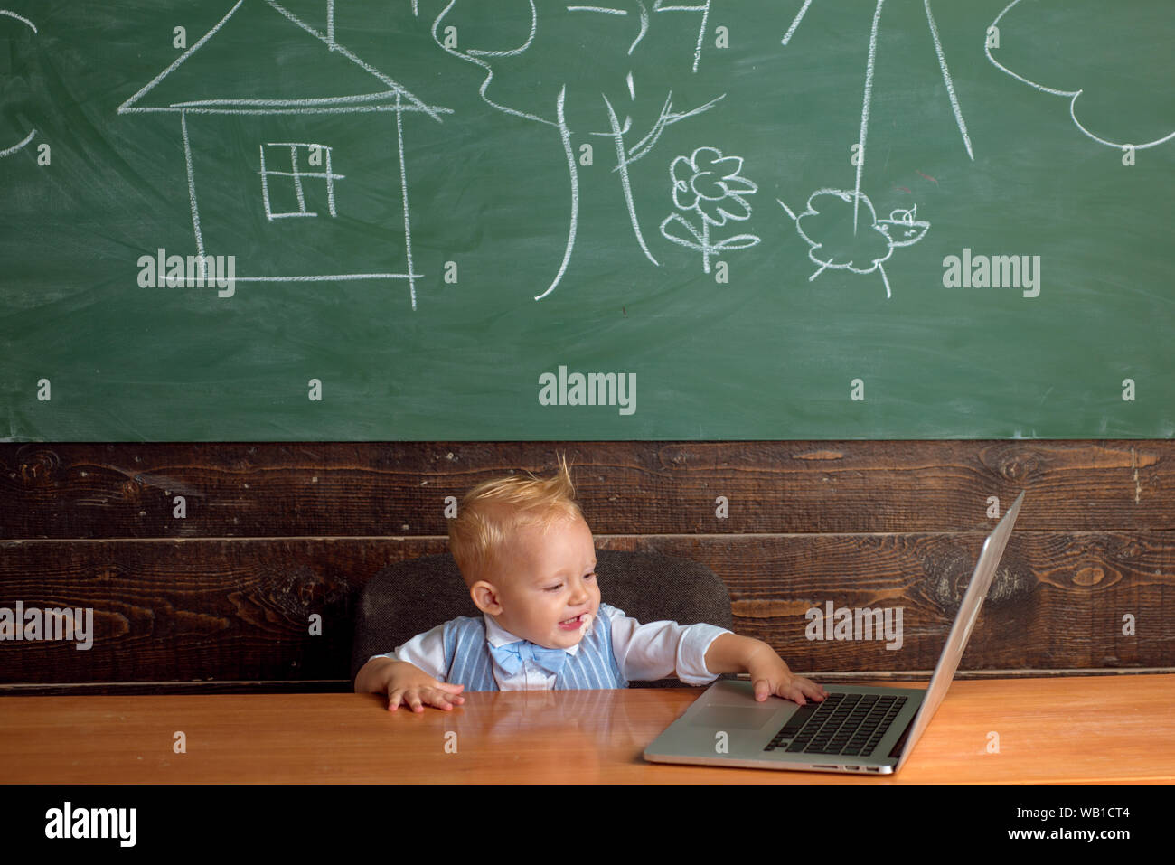 Little boy use free internet in computer class. Preschooler have access ...