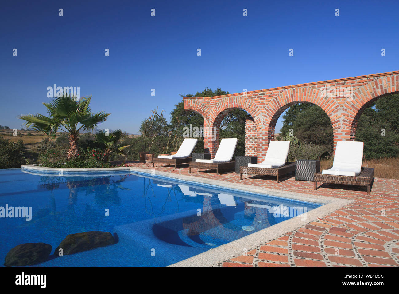 A swimming pool at the luxurious rancho las cascadas in rural Mexico ...