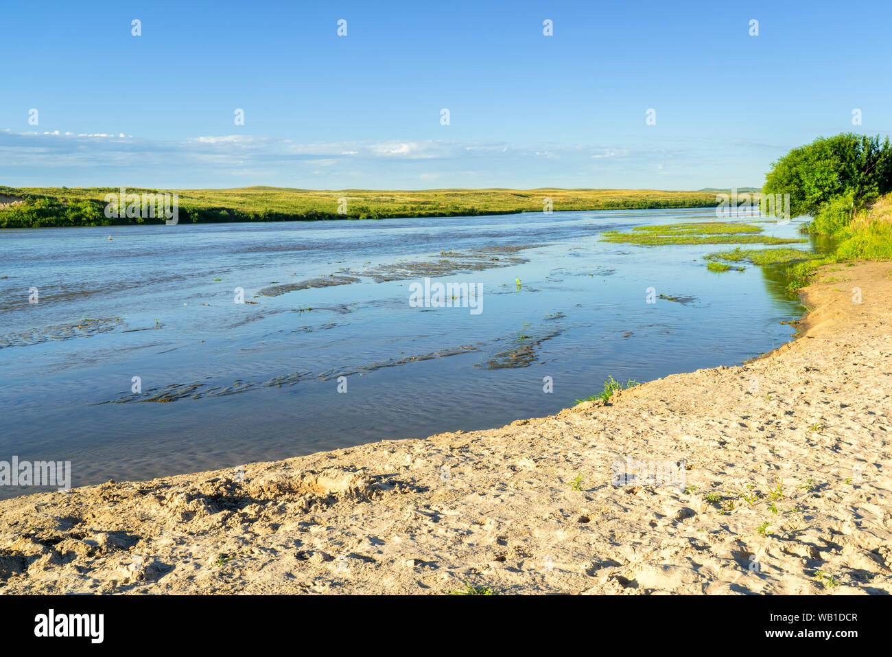 shallow and wide Dismal RIver meandering trough Nebraska Sandhills at ...
