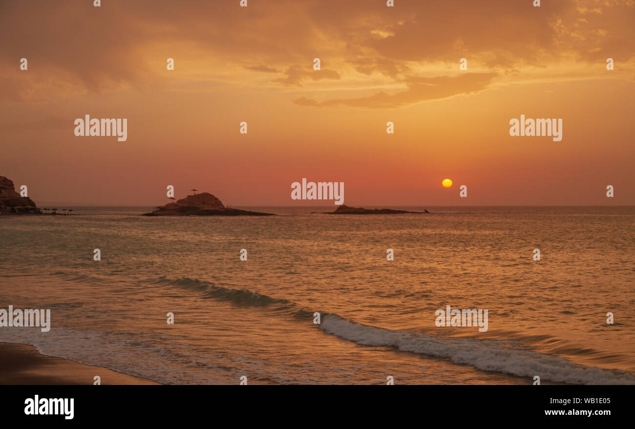 The sunset under the beautiful blue sky on beach Stock Photo - Alamy