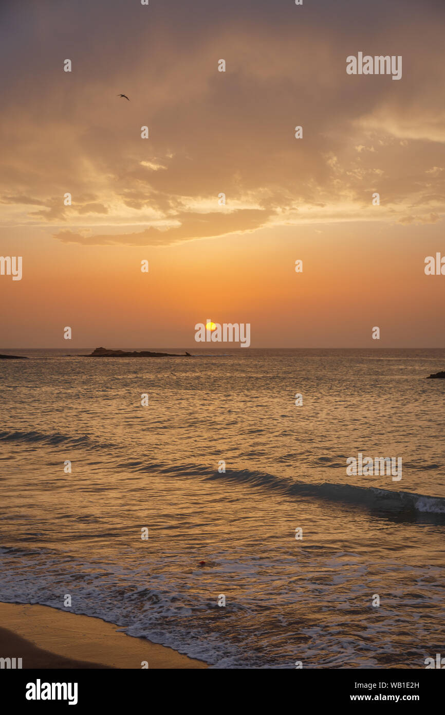The sunset under the beautiful blue sky on beach Stock Photo - Alamy