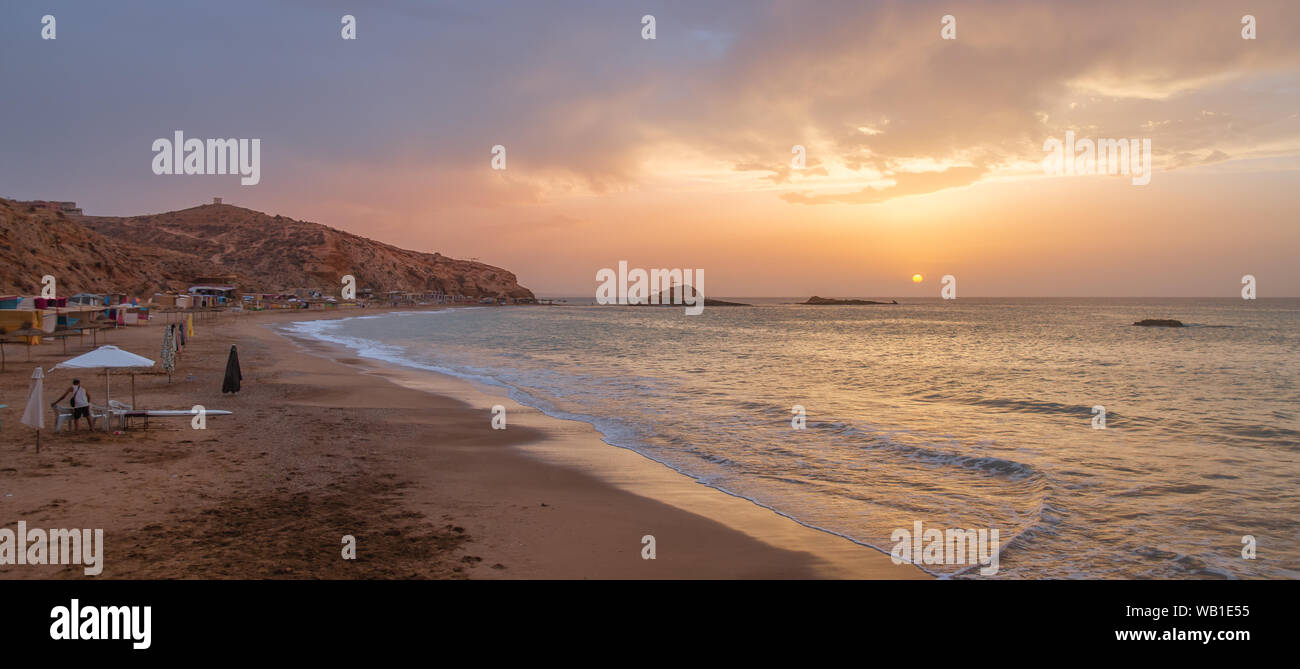 The sunset under the beautiful blue sky on beach Stock Photo - Alamy