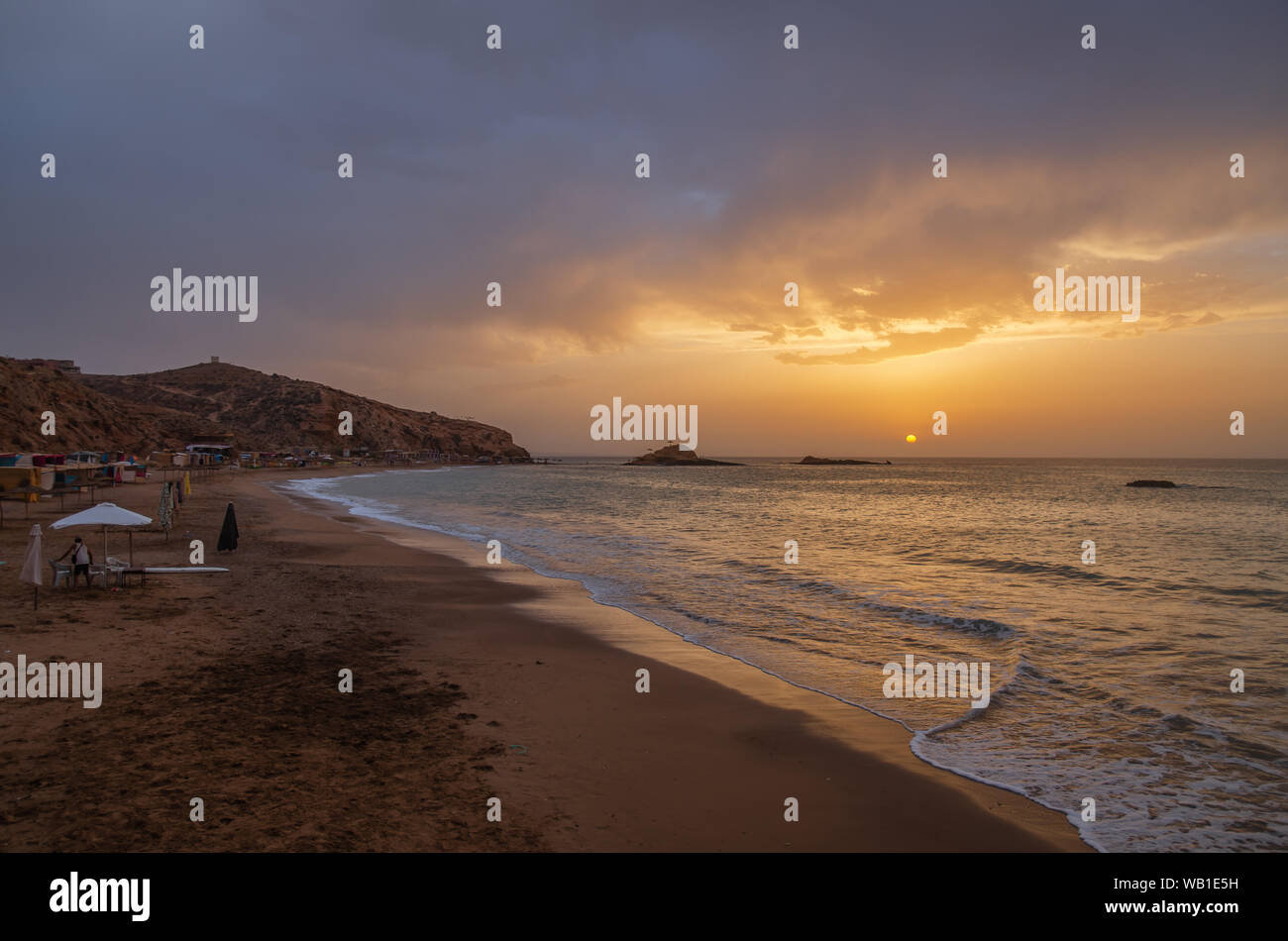 The sunset under the beautiful blue sky on beach Stock Photo - Alamy